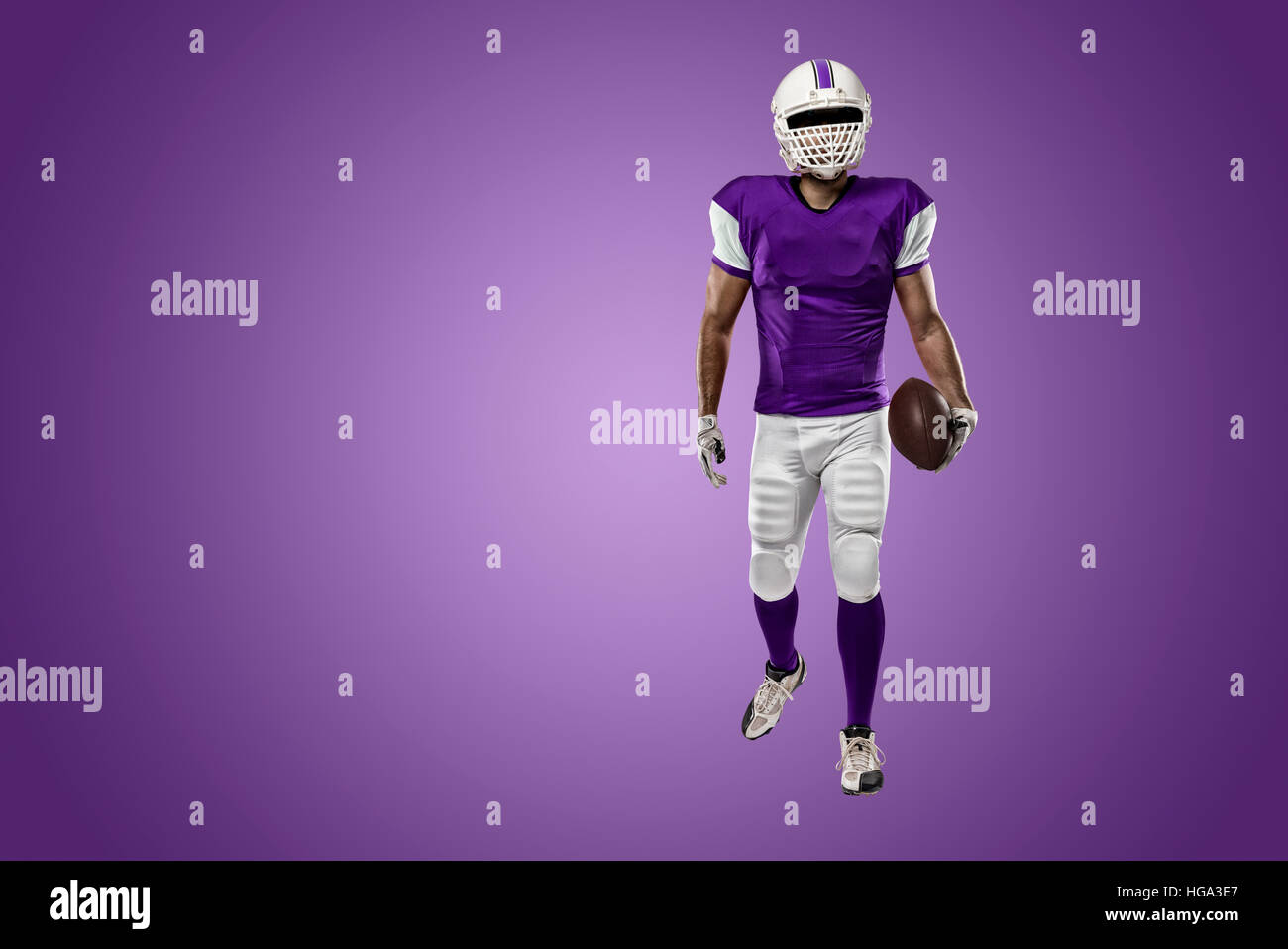 Football Player with a purple uniform on a purple background Stock ...