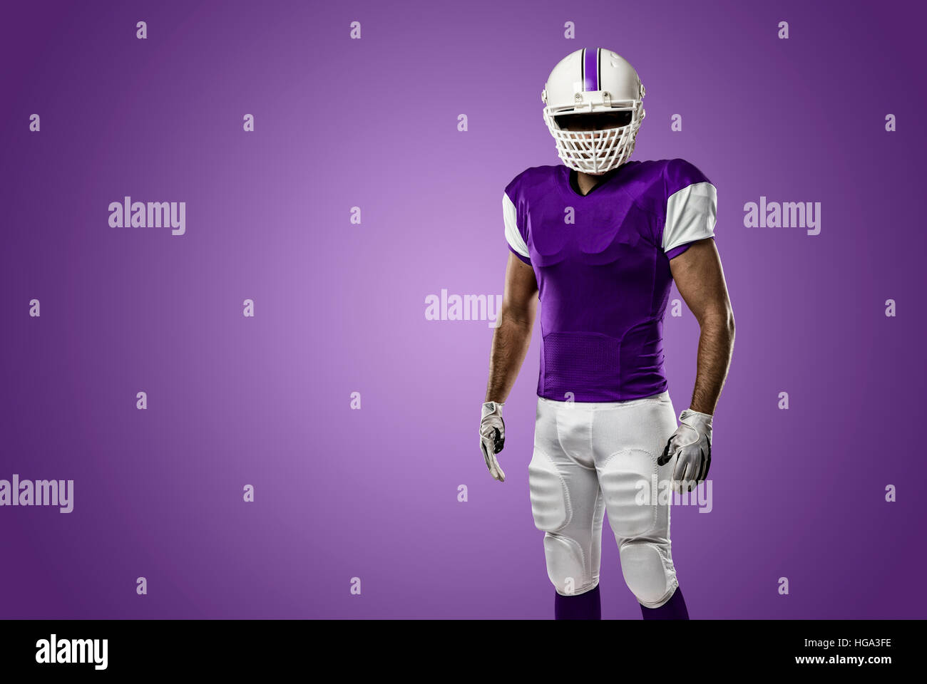 Football Player with a purple uniform on a purple background Stock ...