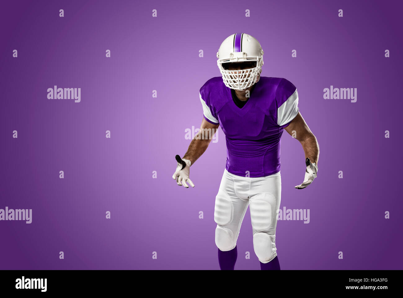 Football Player with a purple uniform on a purple background Stock ...