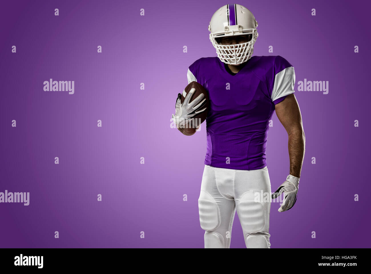 Football Player with a purple uniform on a purple background Stock ...