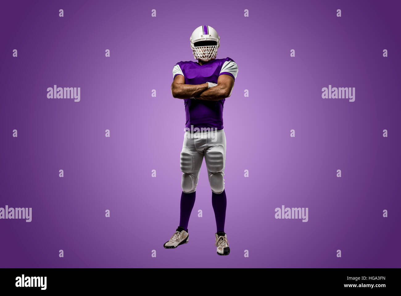 Football Player with a purple uniform on a purple background Stock ...