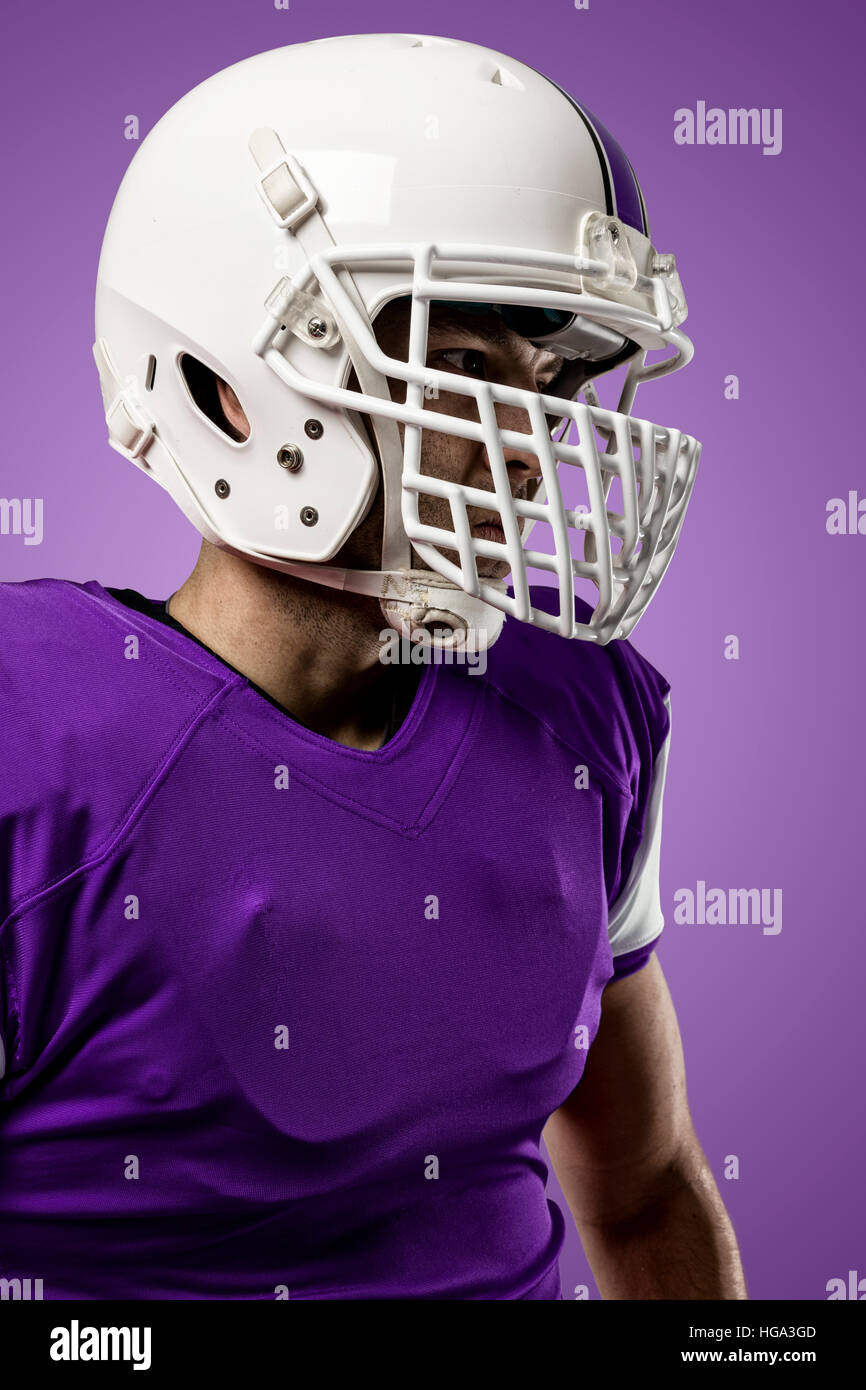 Close up of a Football Player with a purple uniform on a purple ...