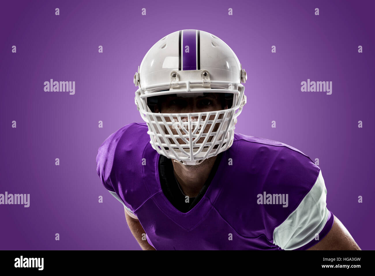 Close up of a Football Player with a purple uniform on a purple ...