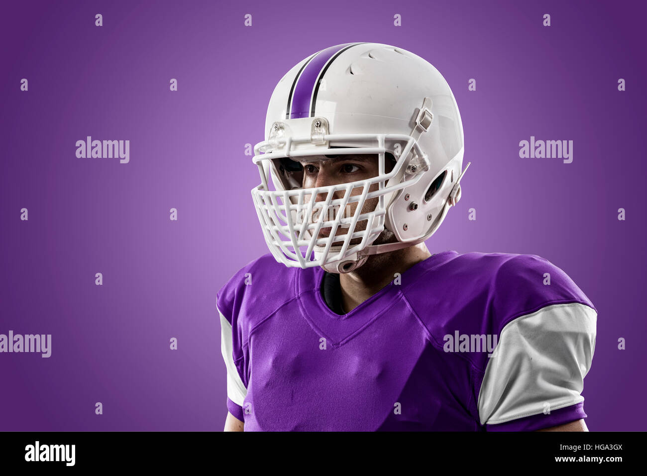 Close up of a Football Player with a purple uniform on a purple ...