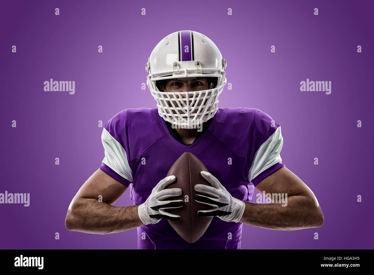 Football Player with a purple uniform on a purple background Stock ...