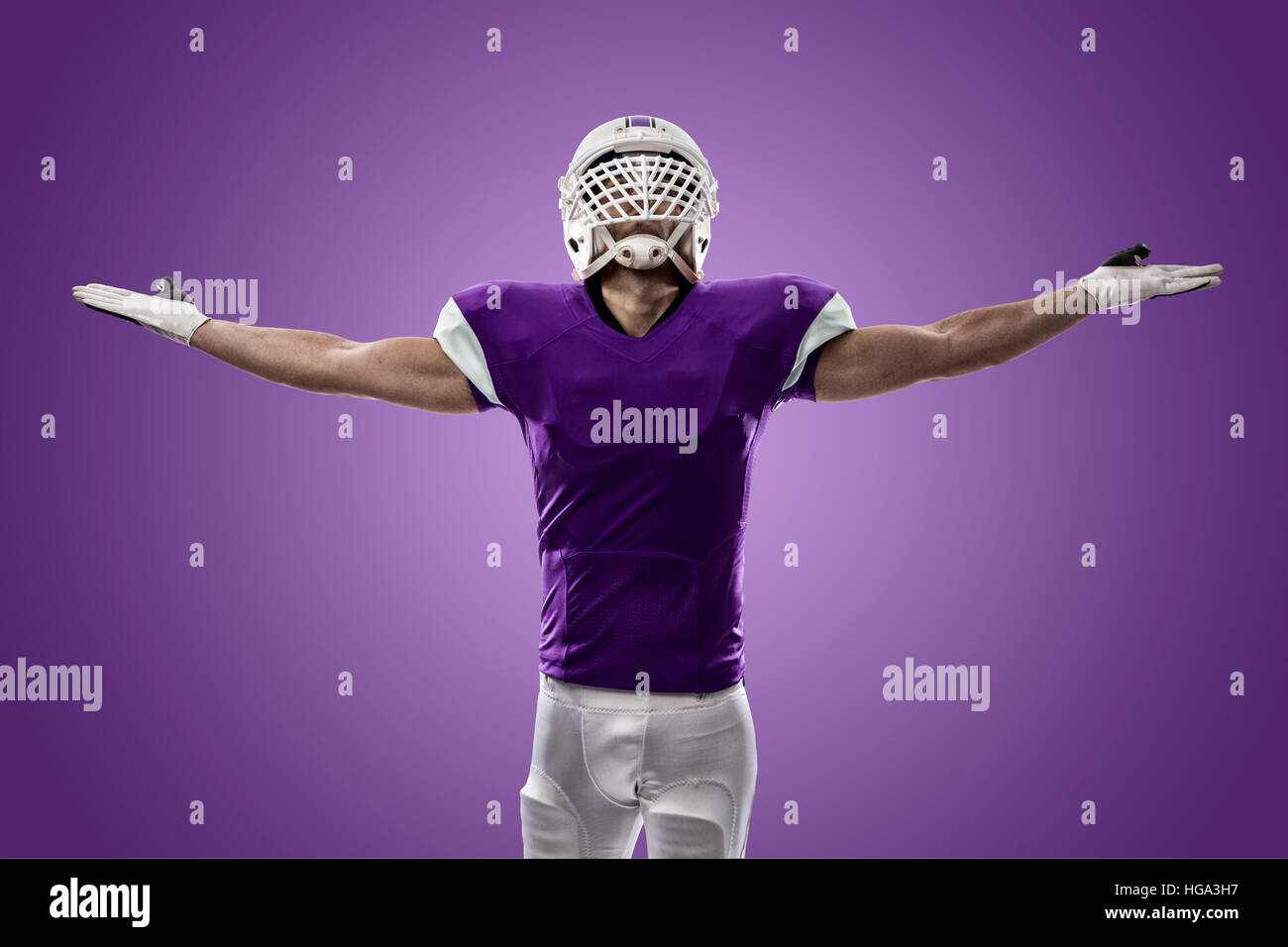 Football Player with a purple uniform celebrating, on a purple ...
