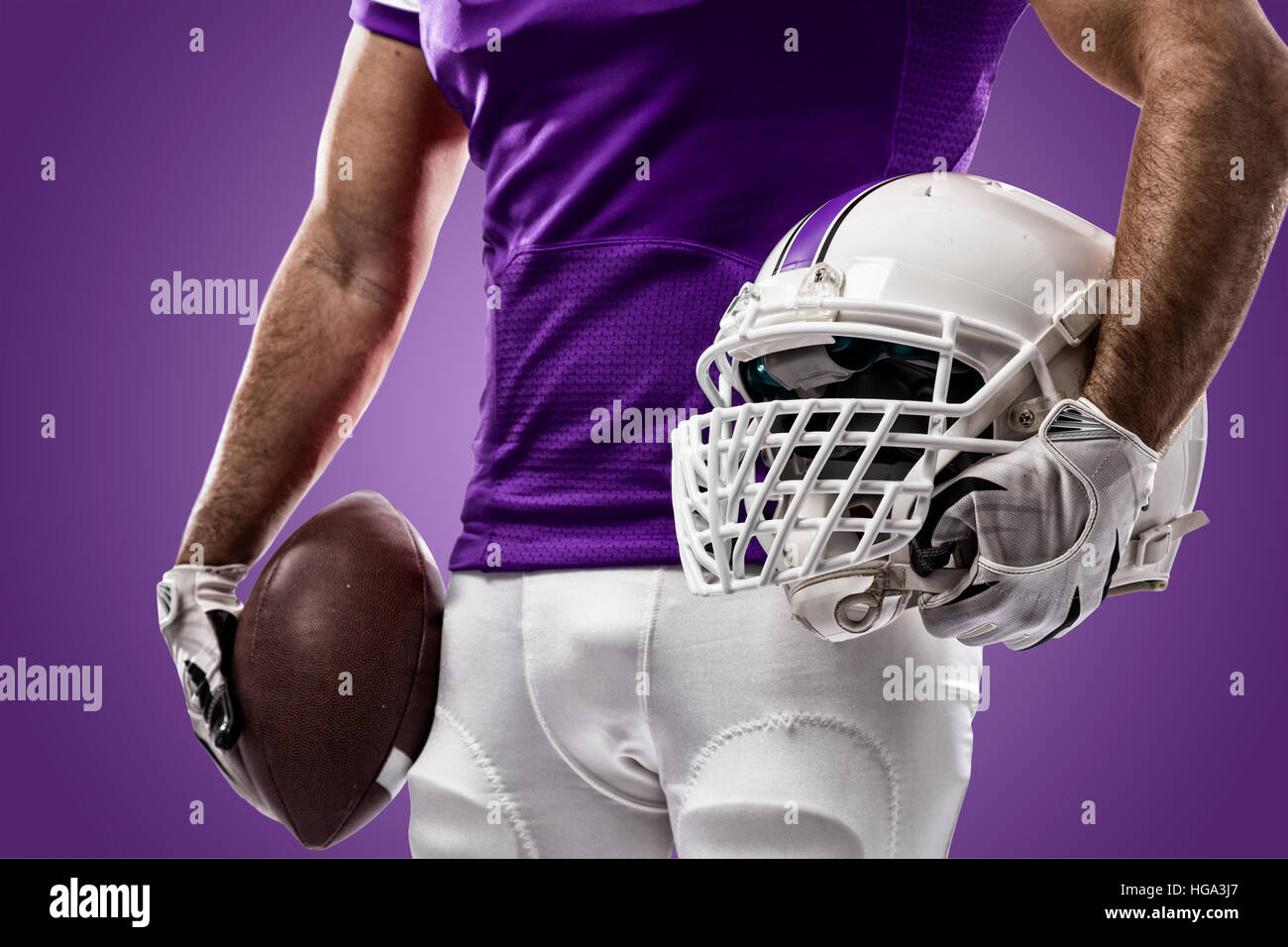 Football Player with a purple uniform on a purple background Stock ...