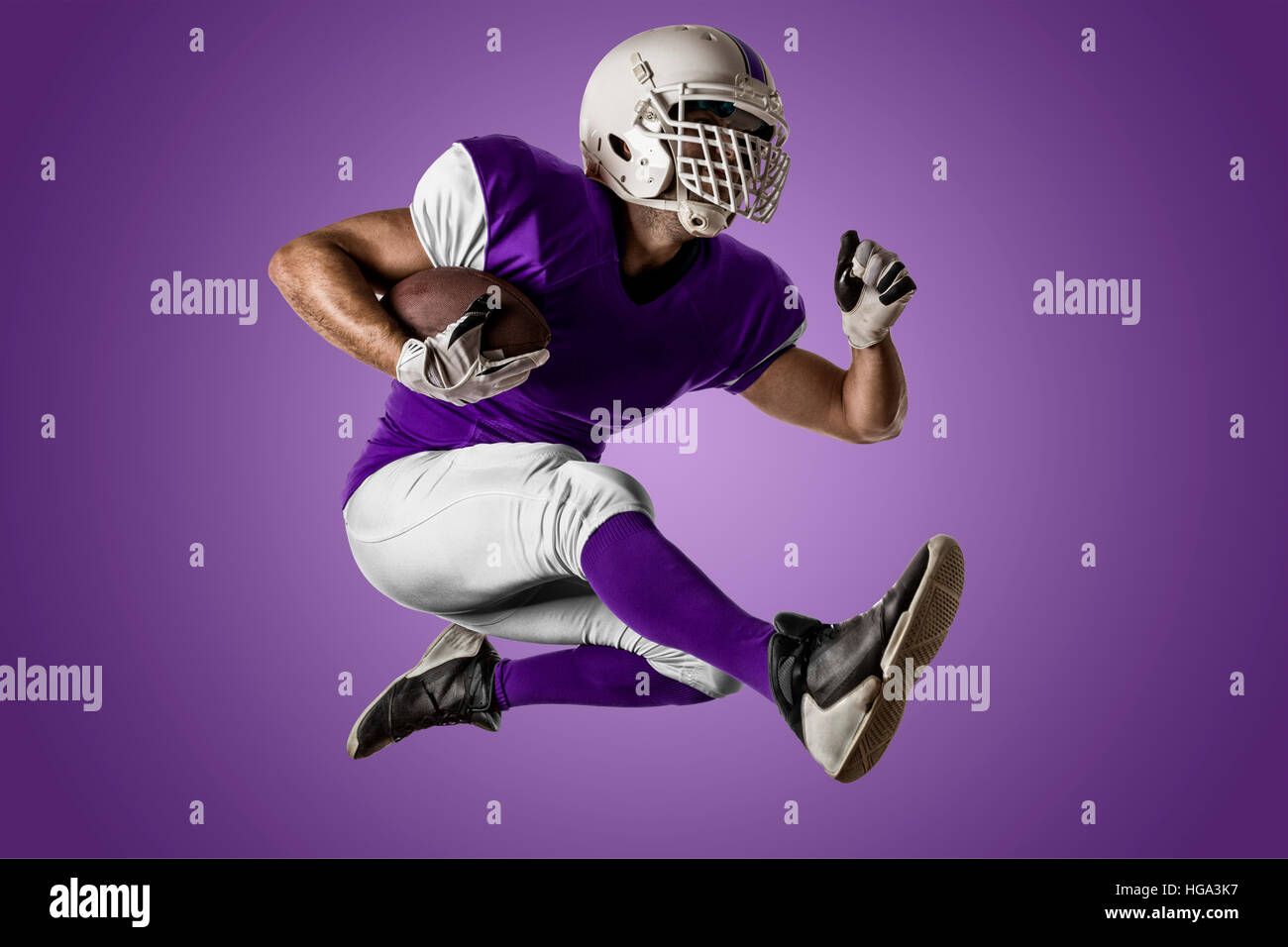 Football Player with a purple uniform Running on a purple background ...