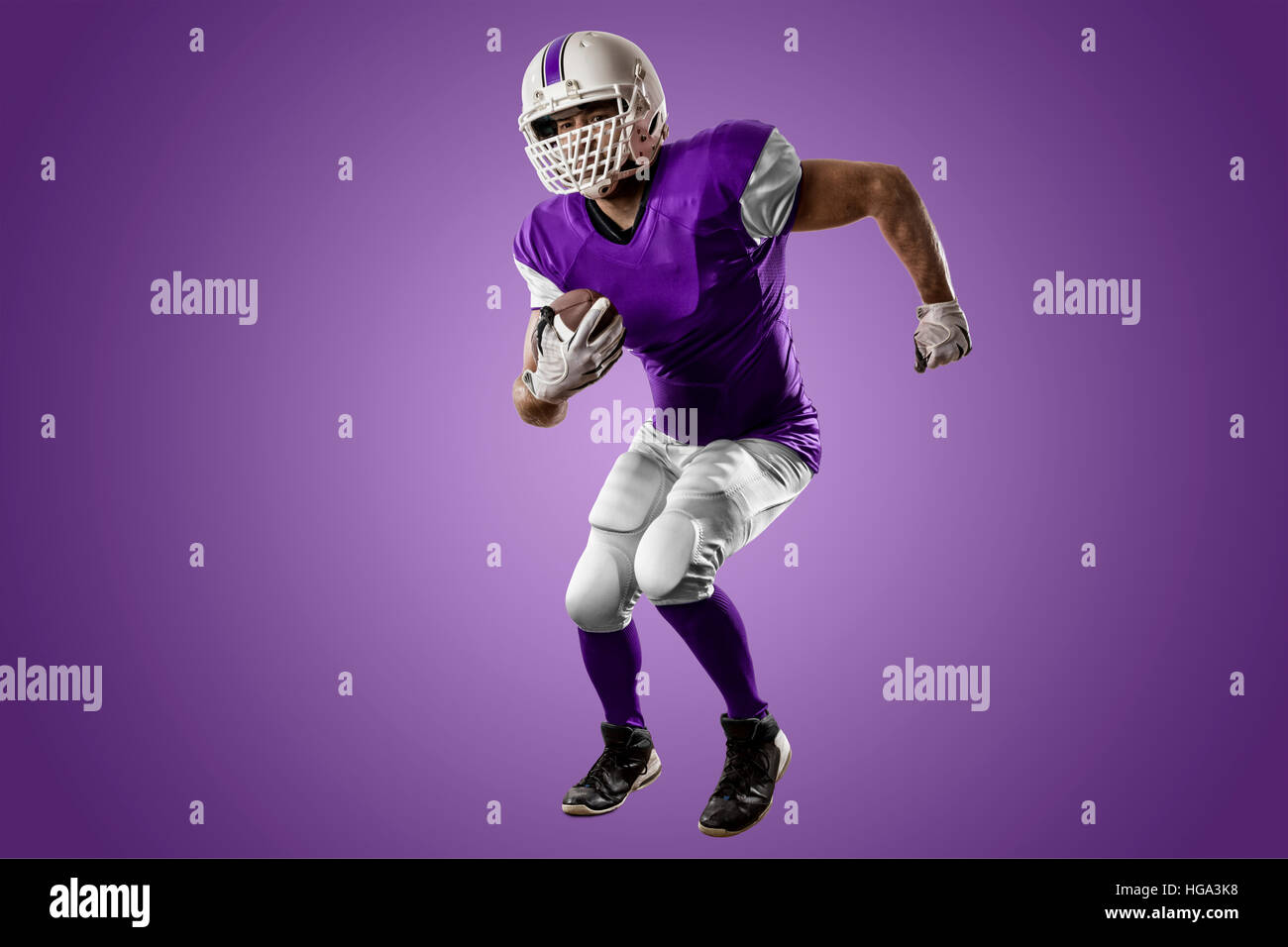 Football Player with a purple uniform Running on a purple background ...