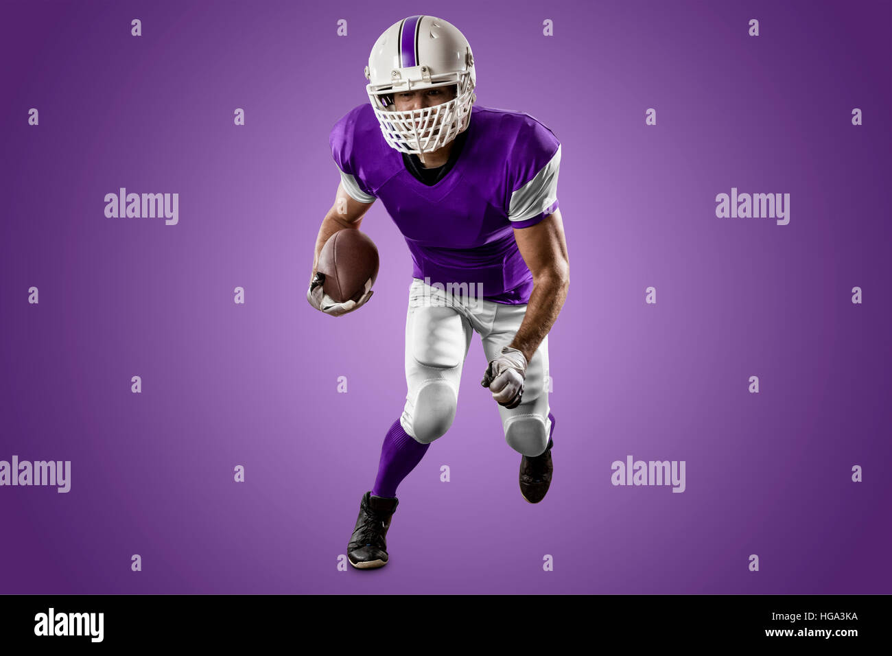 Football Player with a purple uniform Running on a purple background ...