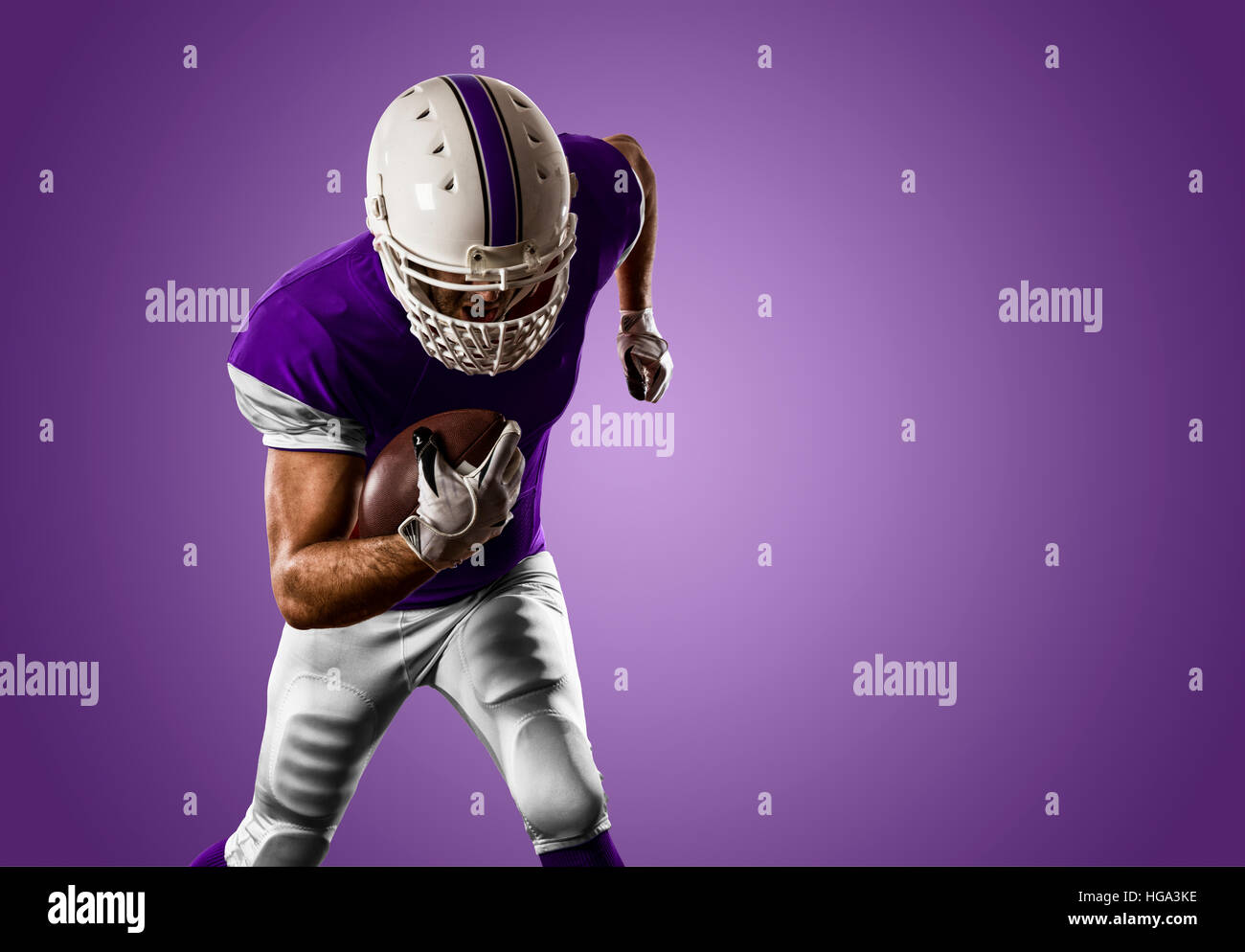 Football Player with a purple uniform Running on a purple background ...