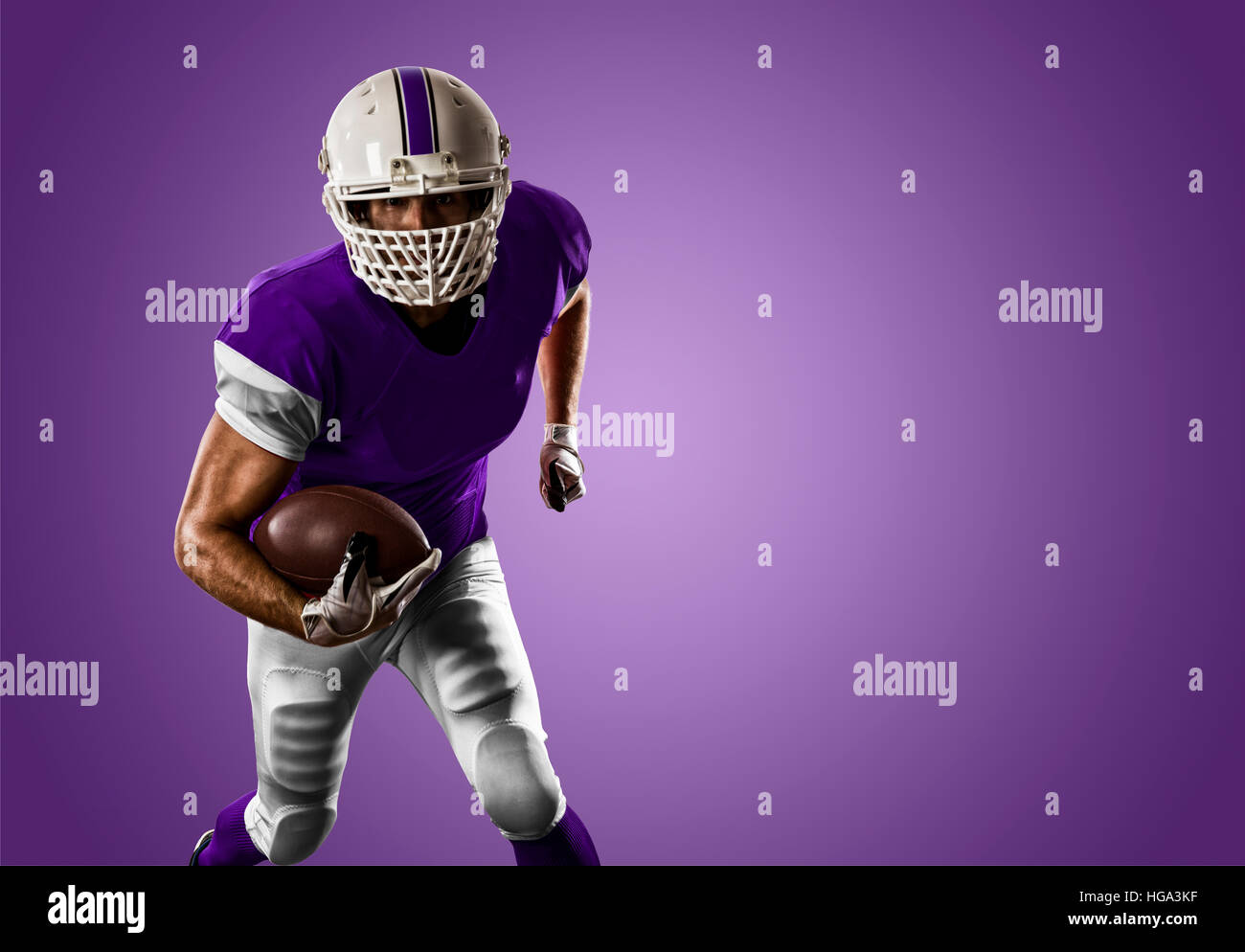 Football Player with a purple uniform Running on a purple background ...