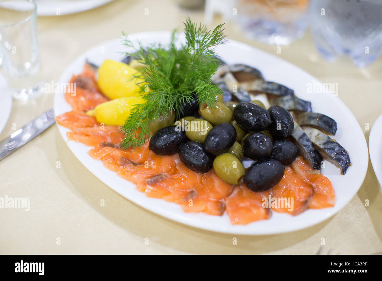 fresh roast wild pink salmon meat fillet with black olives and raw ...