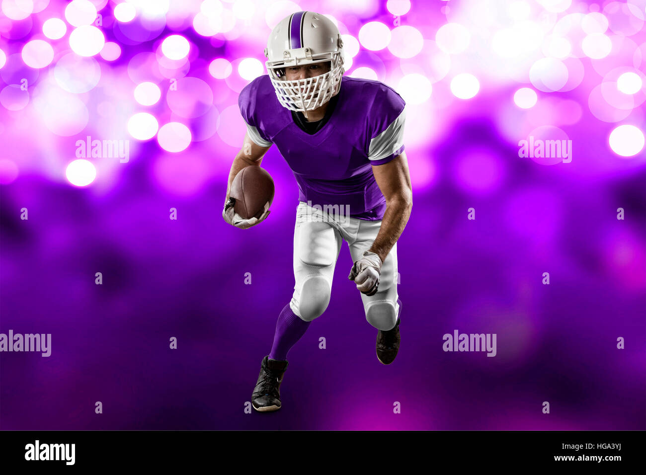 Football Player with a purple uniform Running on a purple lights ...