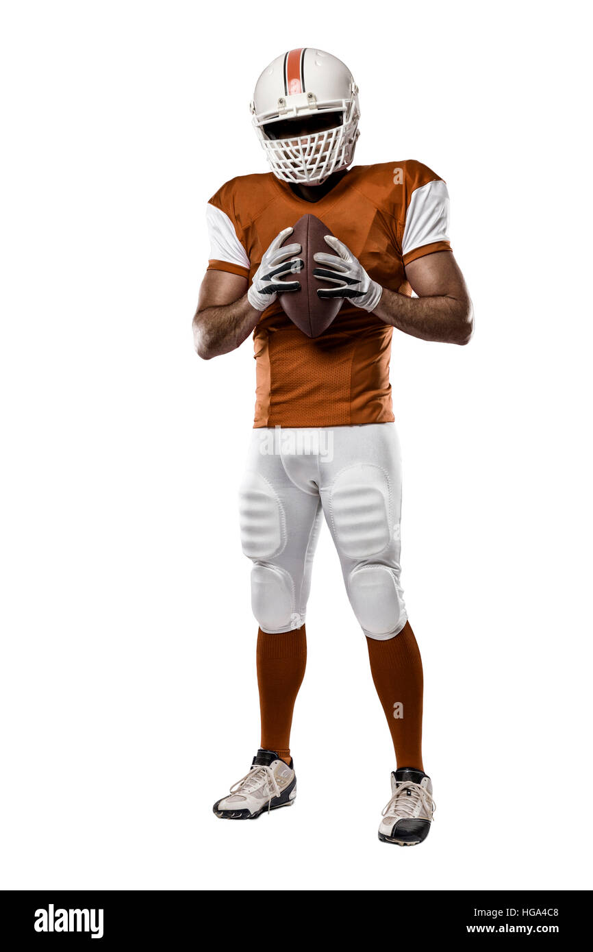 Football Player with a orange uniform on a white background Stock Photo ...