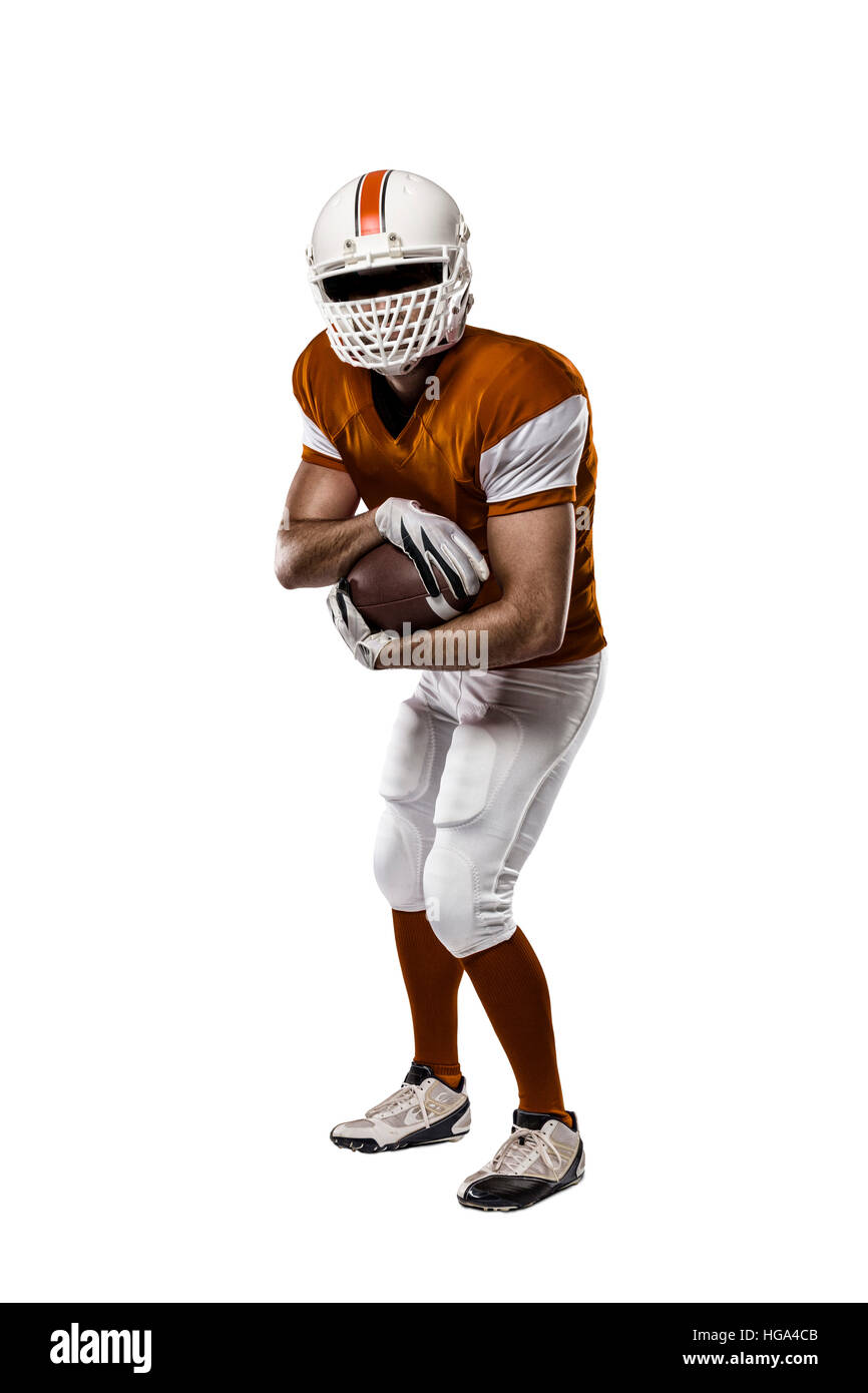Football Player with a orange uniform on a white background Stock Photo ...