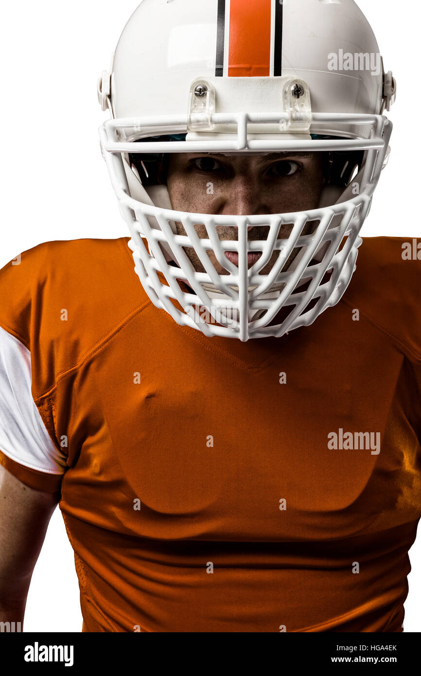 Close up of a Football Player with a orange uniform on a white ...