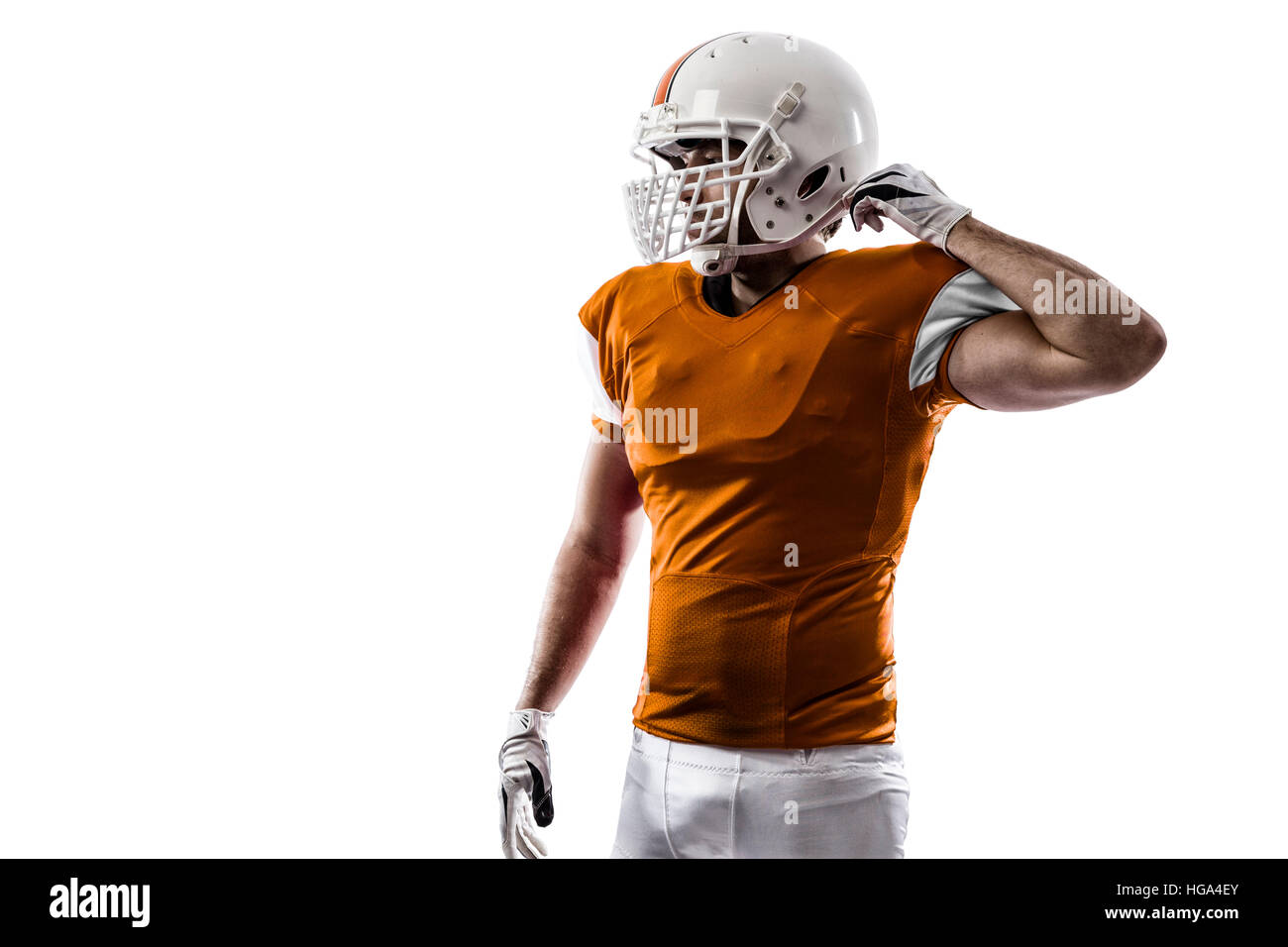 Football Player with a orange uniform on a white background Stock Photo ...