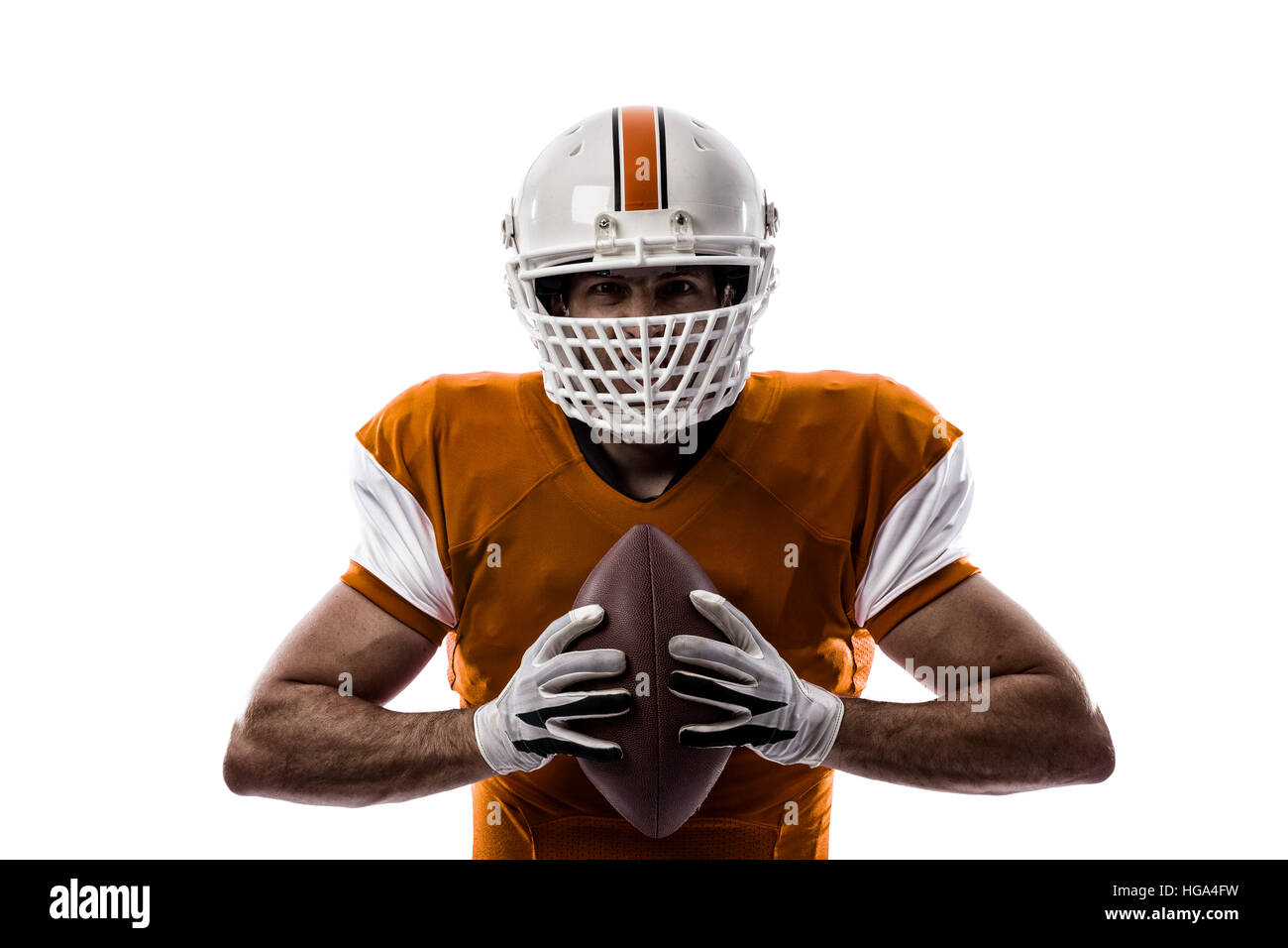 Football Player with a orange uniform on a white background Stock Photo ...