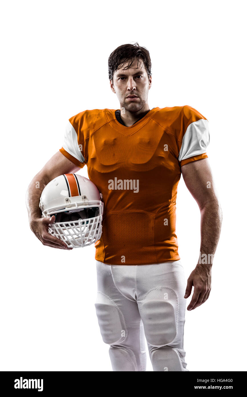 Football Player with a orange uniform on a white background Stock Photo ...