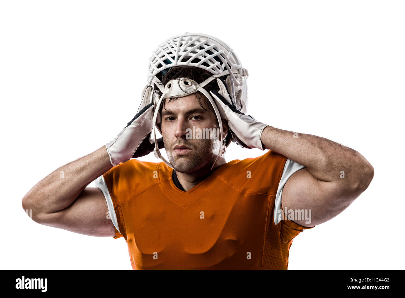 Football Player with a orange uniform on a white background Stock Photo ...