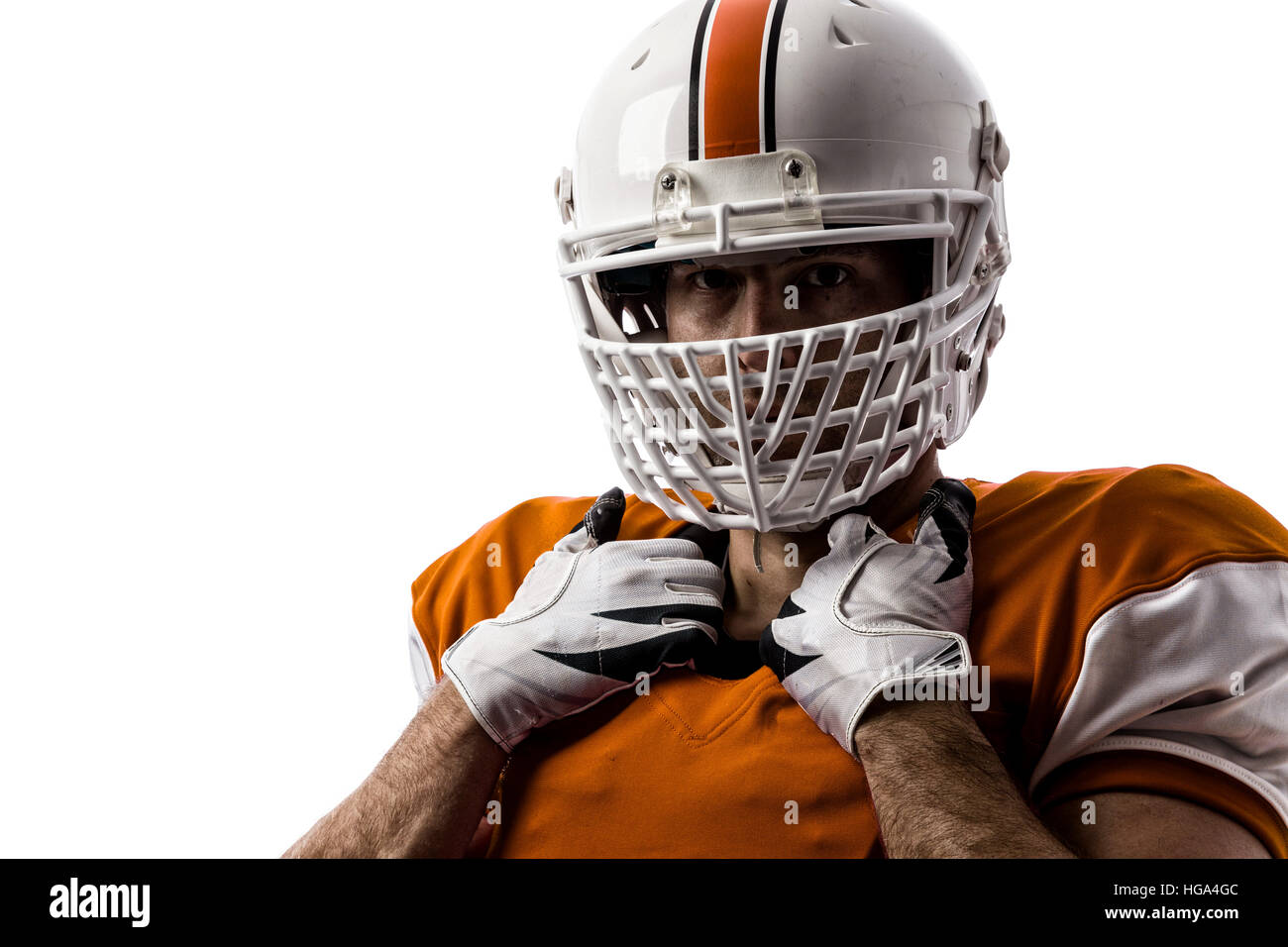 Football Player with a orange uniform on a white background Stock Photo ...