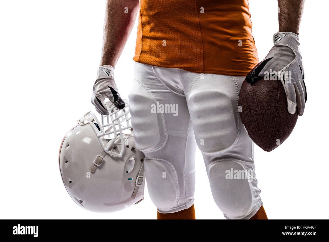 Football Player with a orange uniform on a white background Stock Photo ...