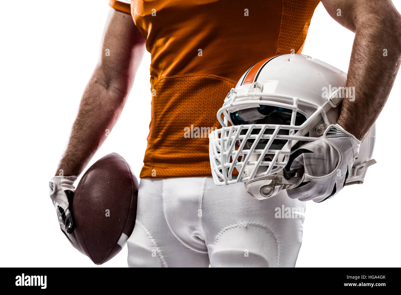 Football Player with a orange uniform on a white background Stock Photo ...