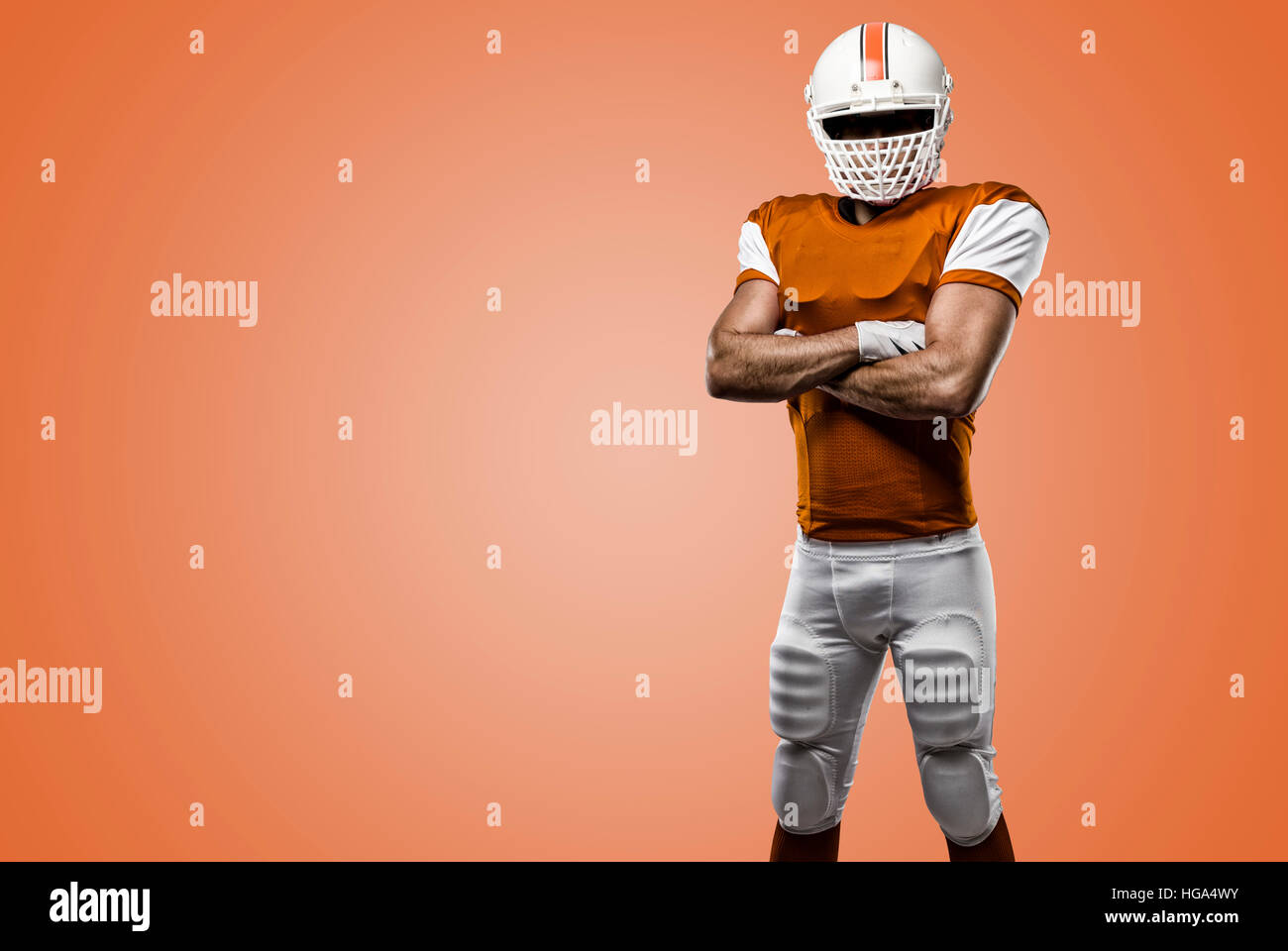 Football Player with a orange uniform on a orange background Stock ...