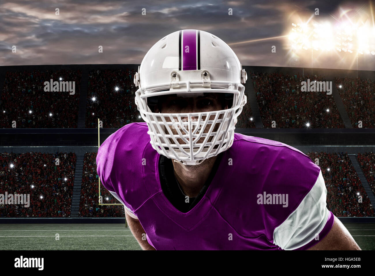 Close up of a Football pink with a white uniform on a stadium Stock ...