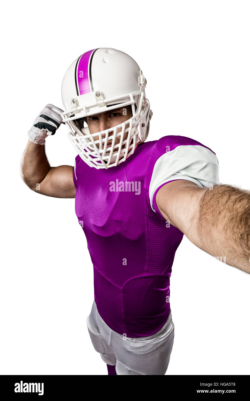 Football Player with a pink uniform making a selfie on a white ...