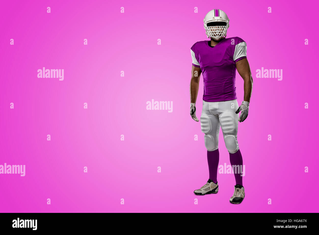 Football Player with a pink uniform on a pink background Stock Photo ...