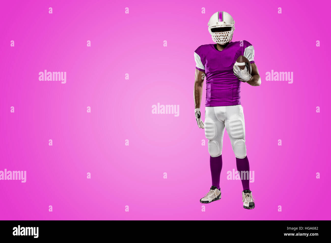 Football Player with a pink uniform on a pink background Stock Photo ...