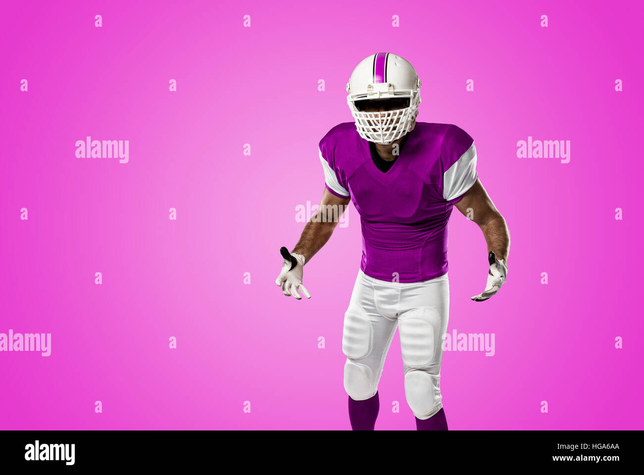 Football Player with a pink uniform on a pink background Stock Photo ...