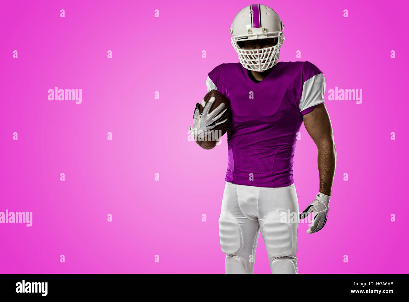 Football Player with a pink uniform on a pink background Stock Photo ...