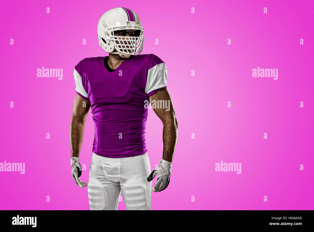 Football Player with a pink uniform on a pink background Stock Photo ...