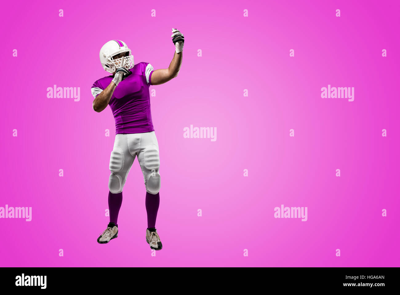 Football Player with a pink uniform making a selfie on a pink ...