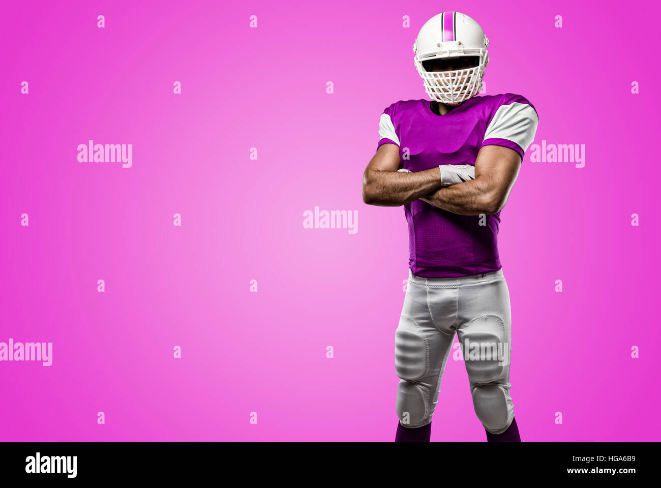 Football Player with a pink uniform on a pink background Stock Photo ...