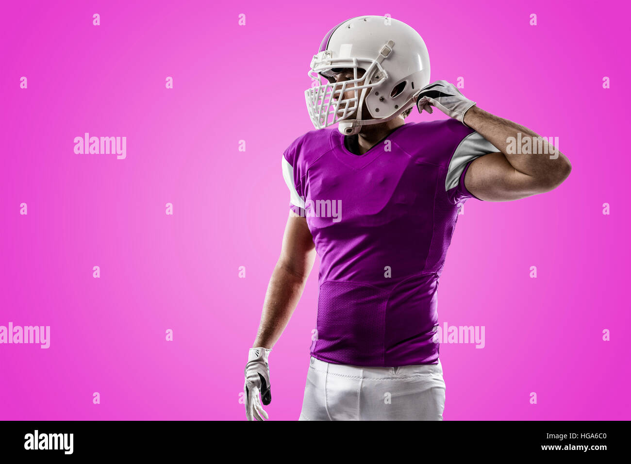 Football Player with a pink uniform on a pink background Stock Photo ...