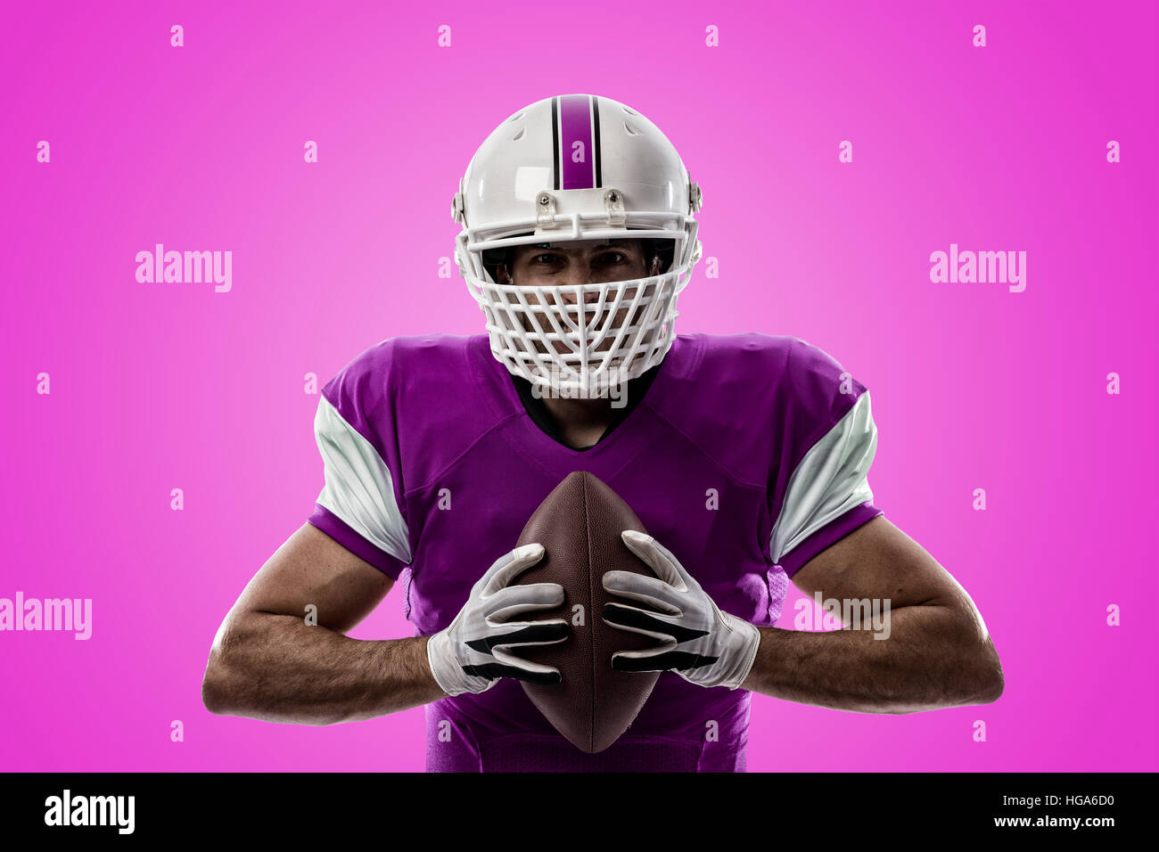 Football Player with a pink uniform on a pink background Stock Photo ...