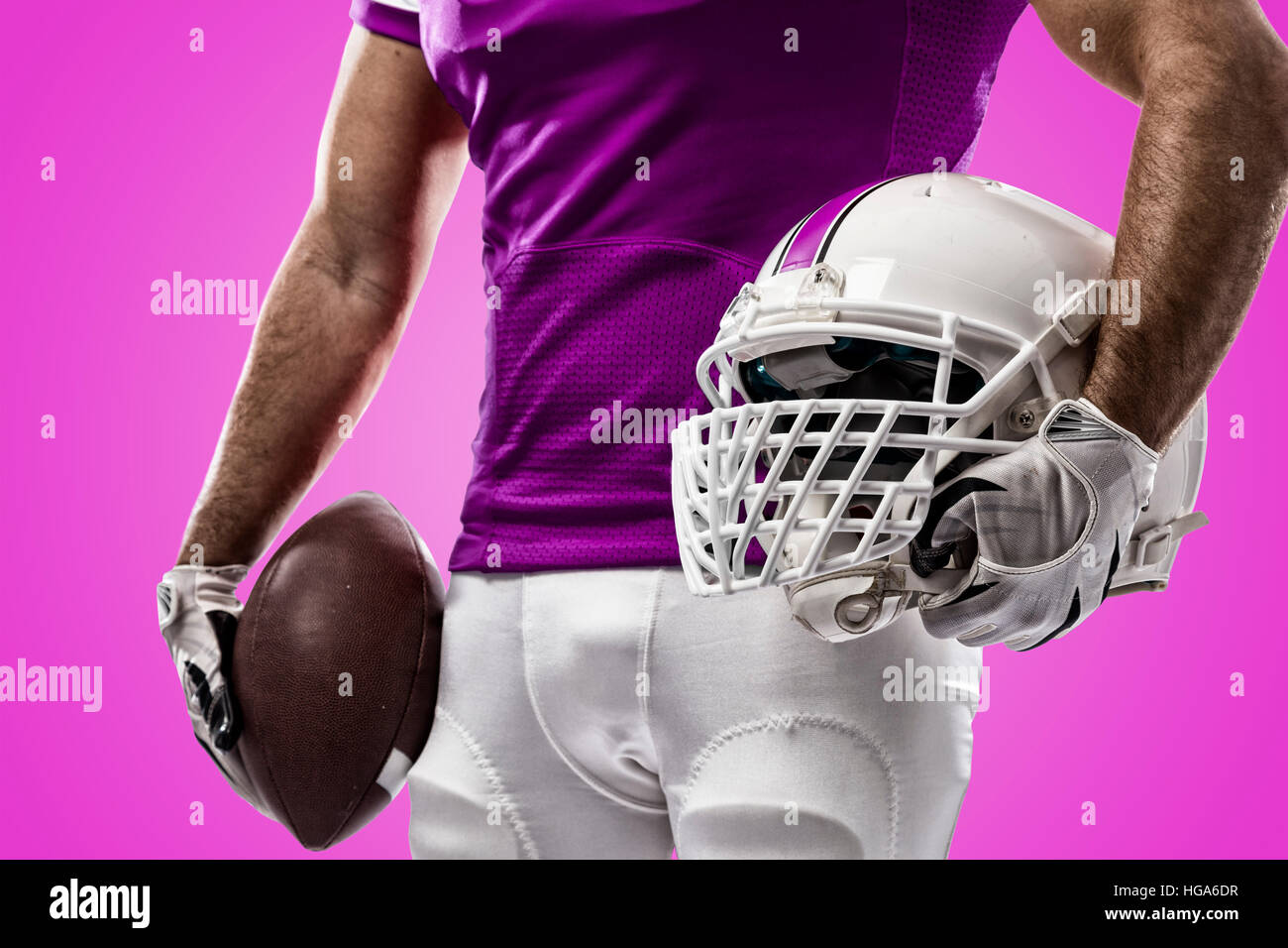 Football Player with a pink uniform on a pink background Stock Photo ...