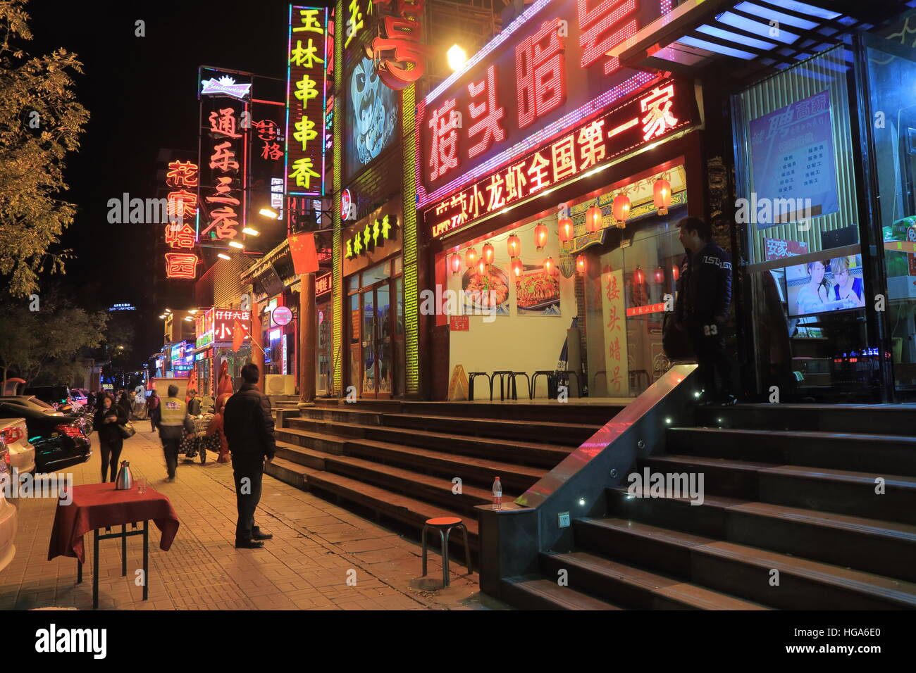 People visit Ghost street in Beijing China. Ghost street know as Guijie ...