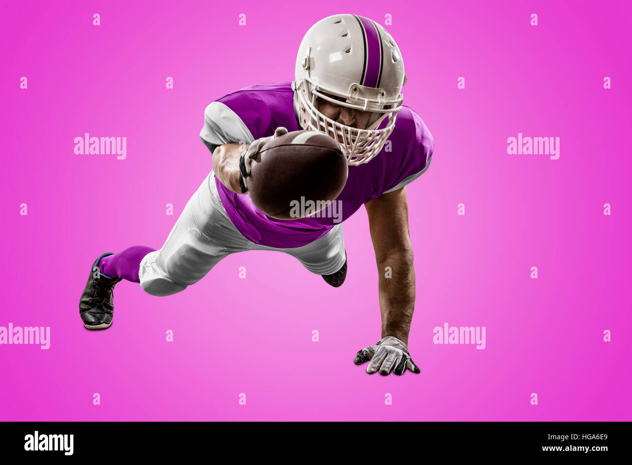 Football Player with a pink uniform scoring on a pink background Stock ...