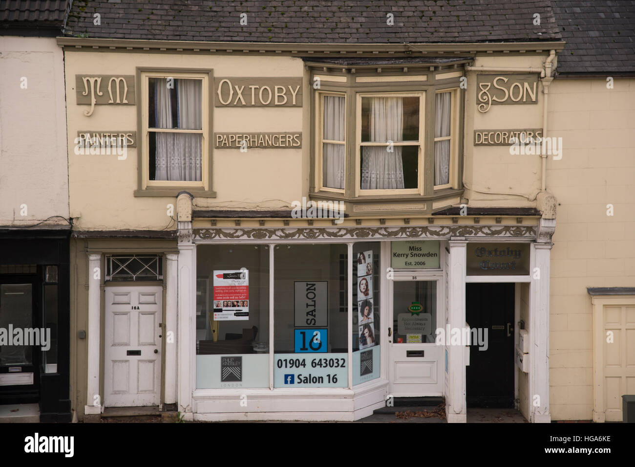 Exterior of Grade 2 listed shop (with sign on the wall) once a painters ...