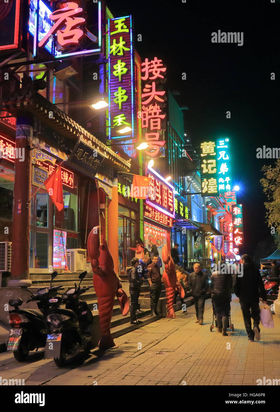 People visit Ghost street in Beijing China. Ghost street know as Guijie ...