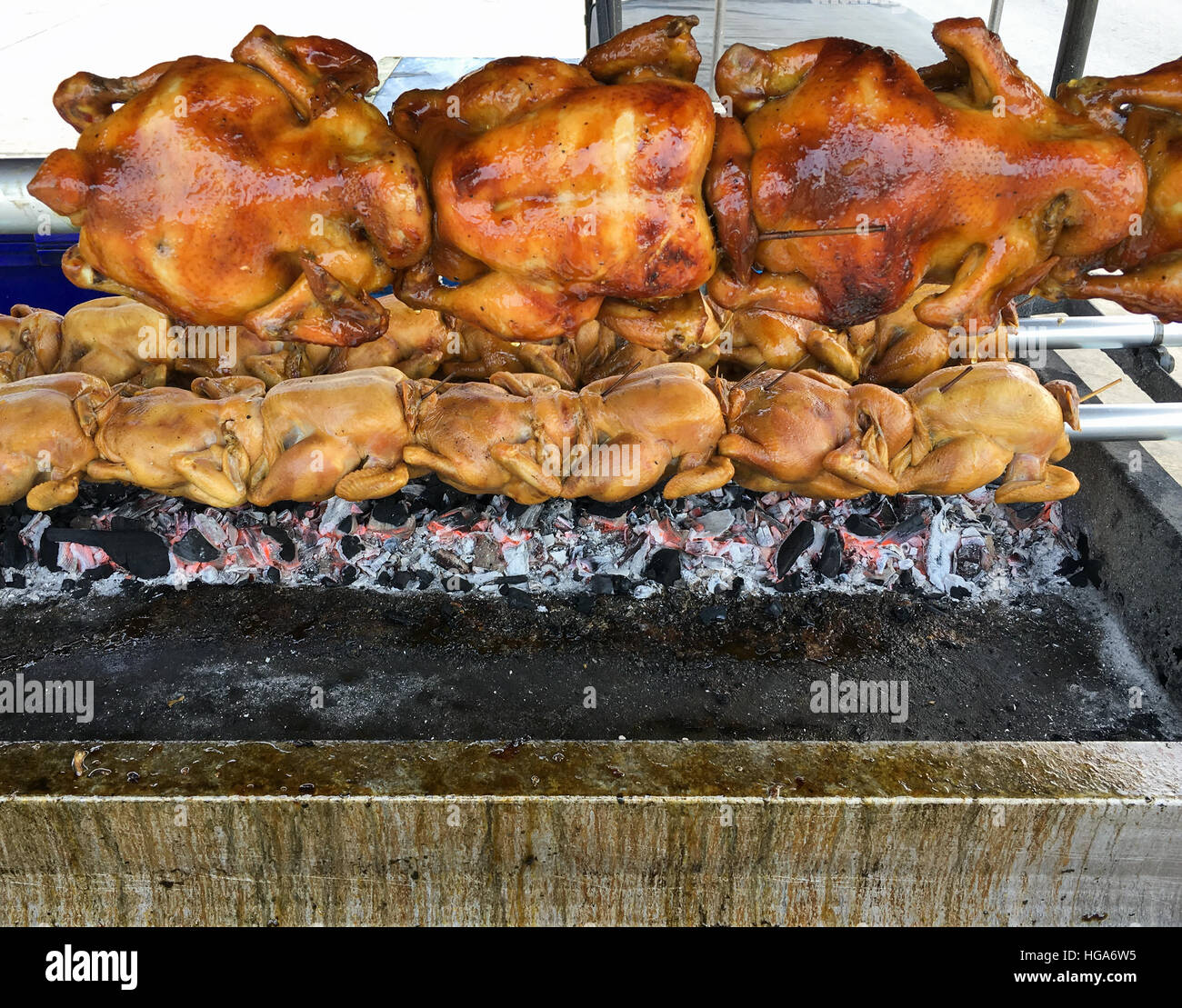 Grilled chicken on the hot charcoal of the local restaurant Stock Photo ...