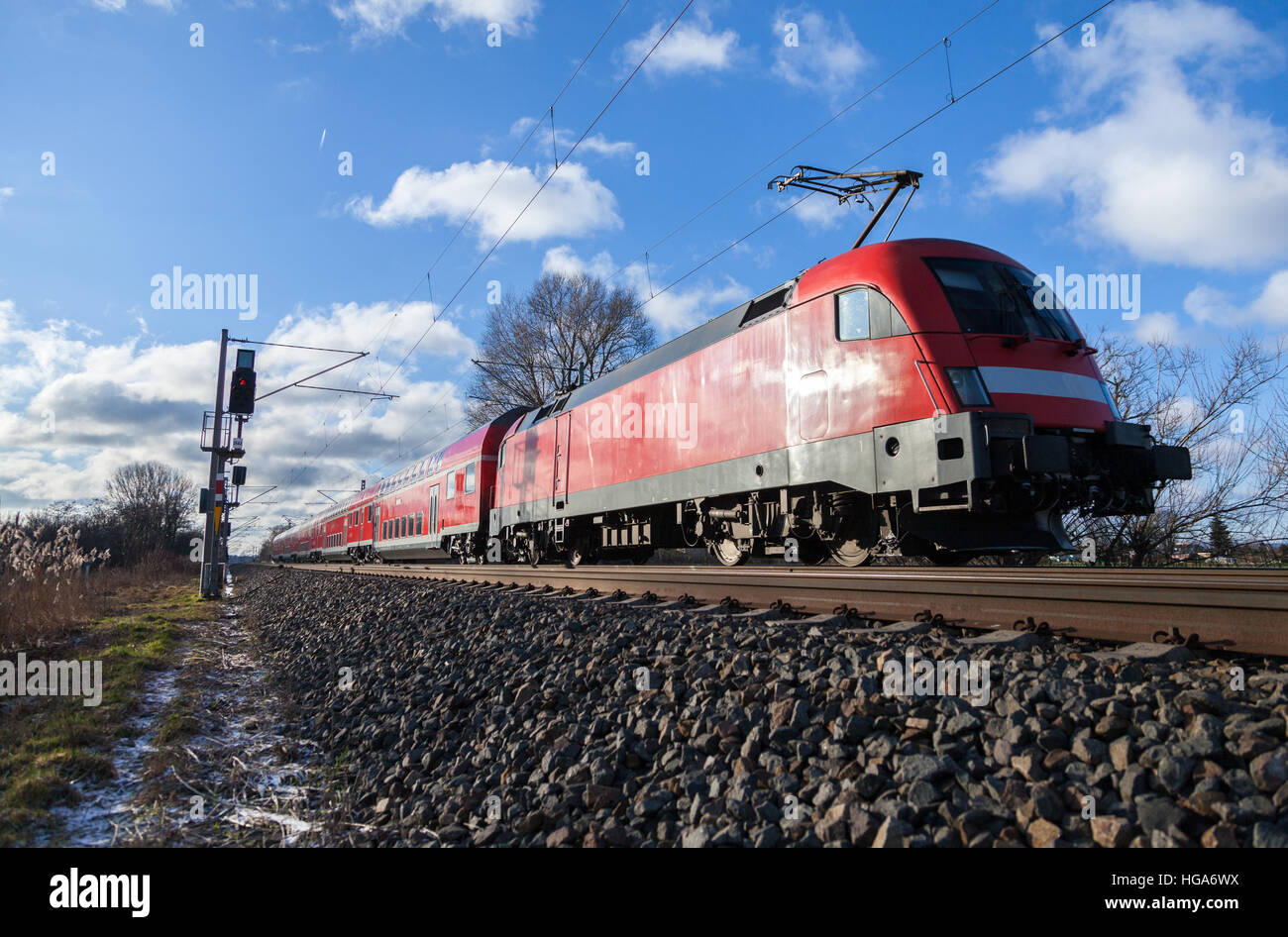 german passenger train drives to the next station Stock Photo - Alamy