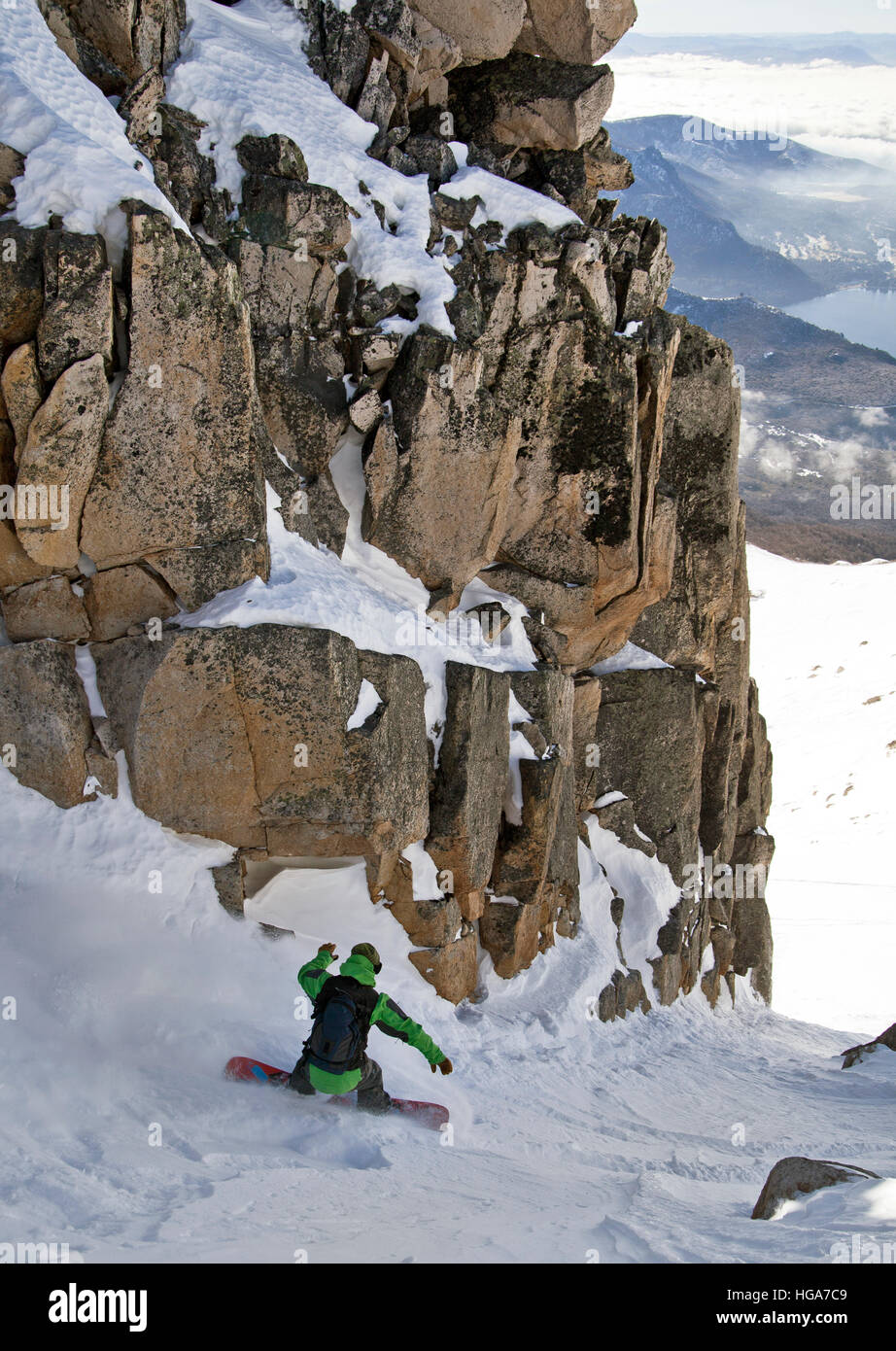 A Snowboarder Makes A Turn In A Narrow Chute High Up In The Andes Stock ...