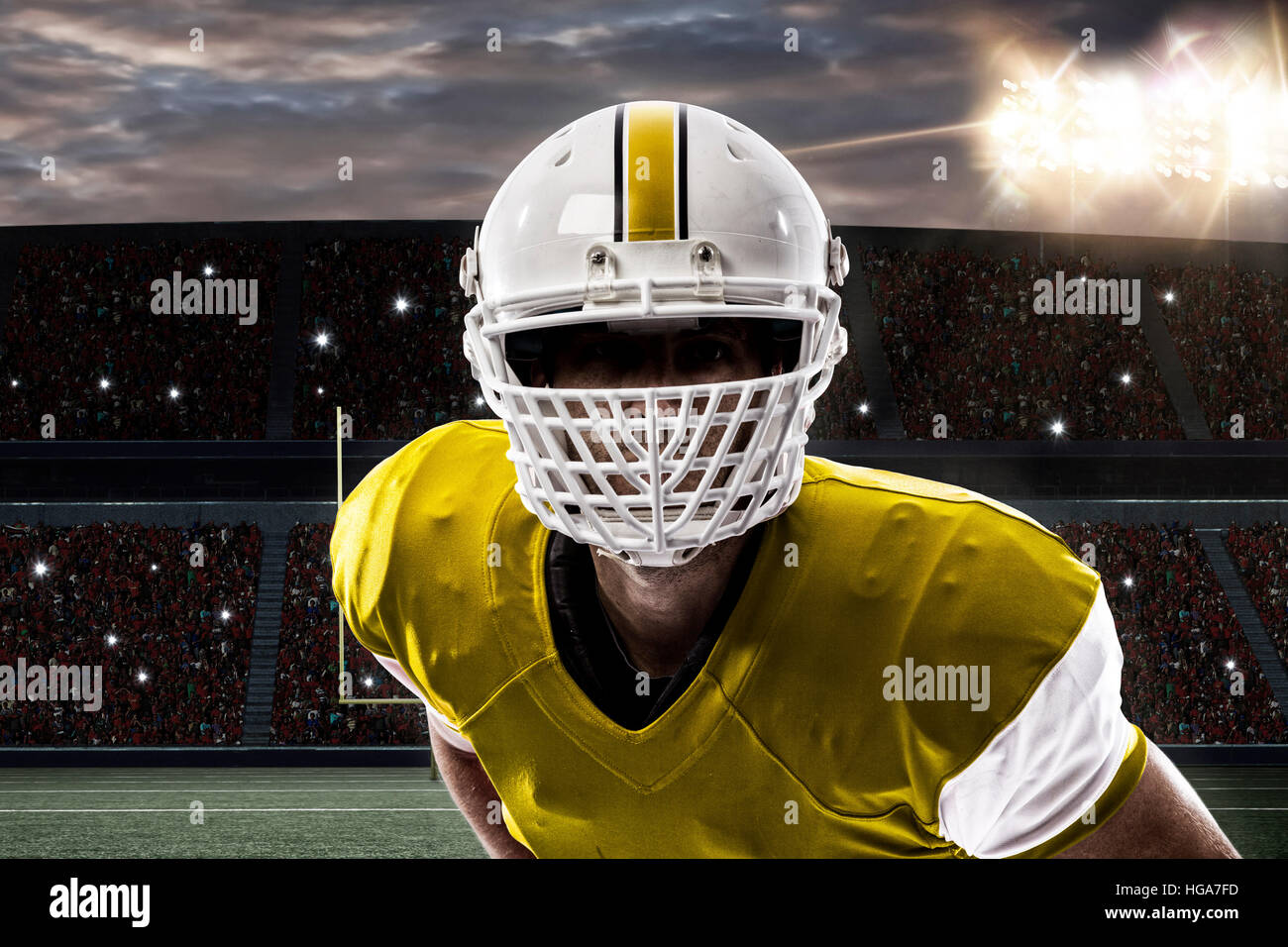 Close up of a Football yellow with a white uniform on a stadium Stock ...