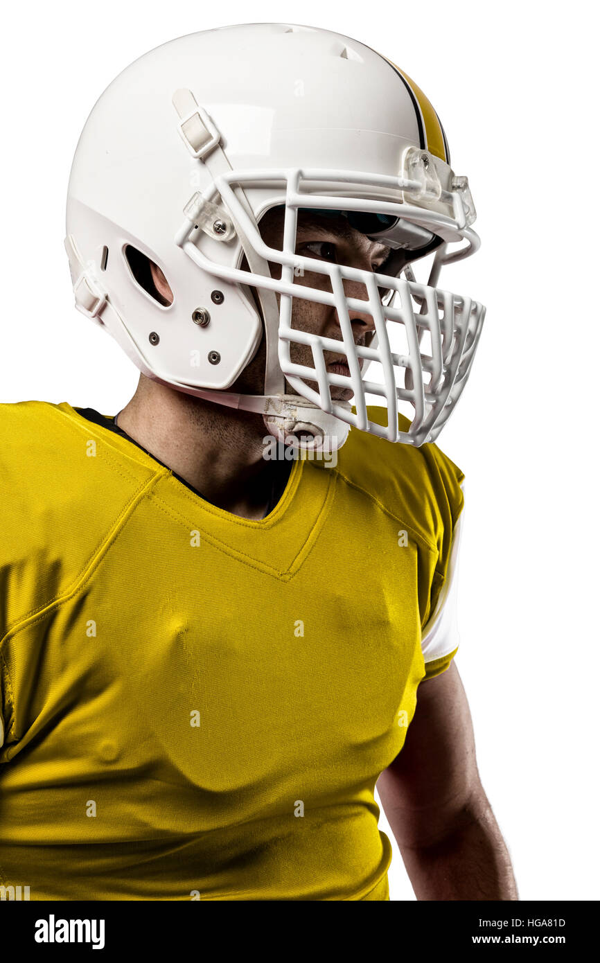 Close up of a Football Player with a yellow uniform on a white ...